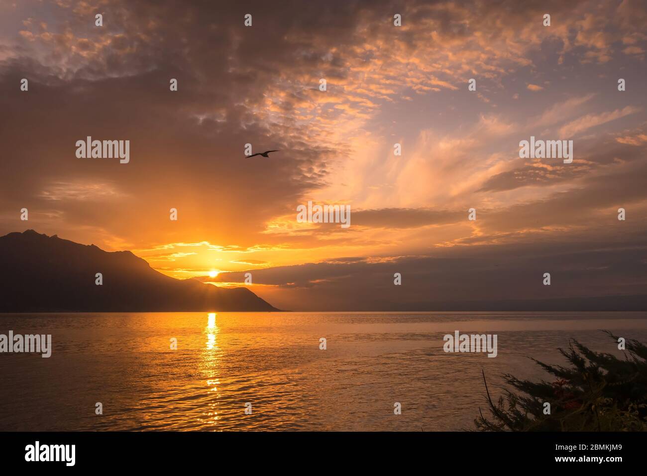 Lake Geneva, Switzerland, panoramic colorful sunset view of Montreux ...