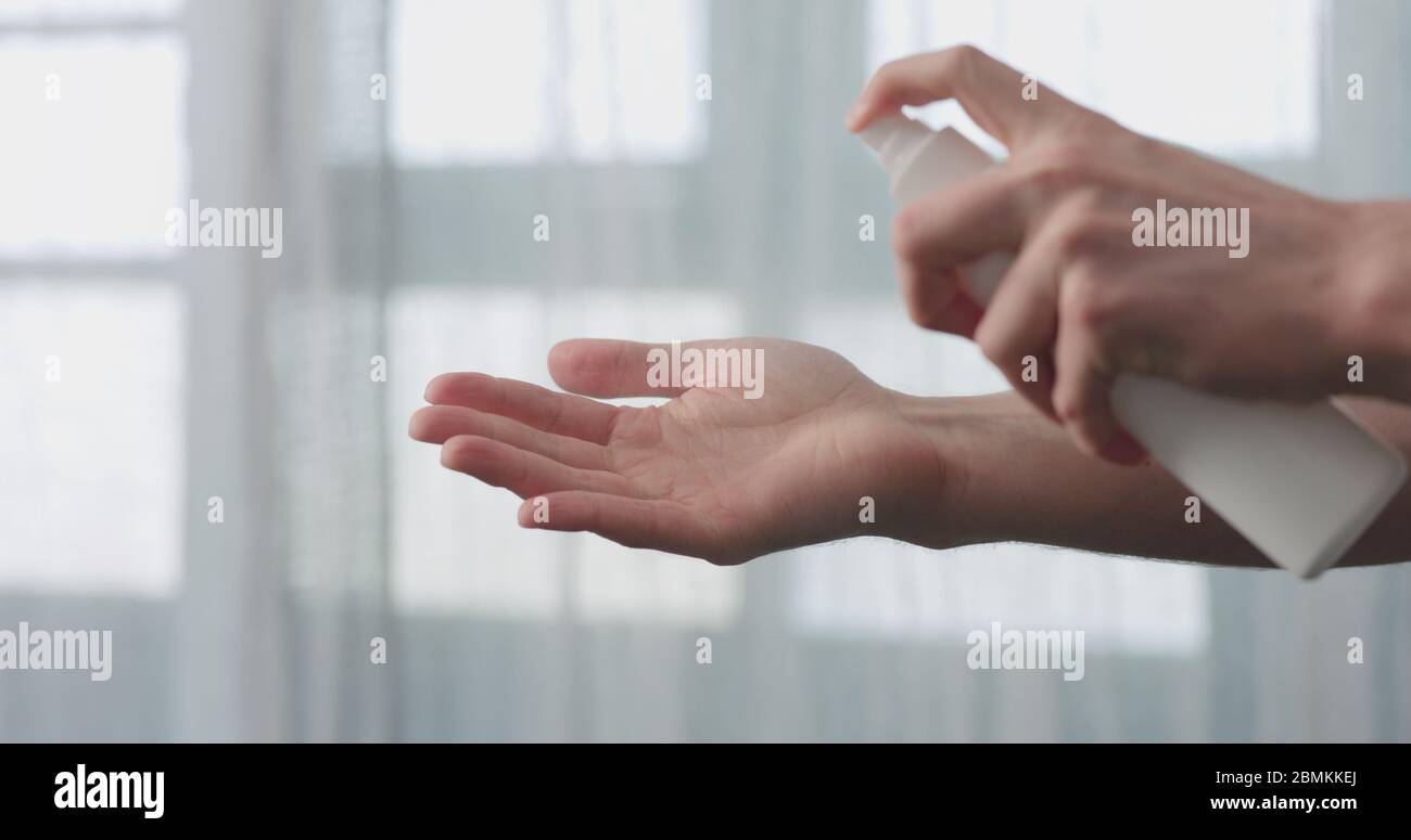 Alcohol spray sanitizer hi-res stock photography and images - Alamy