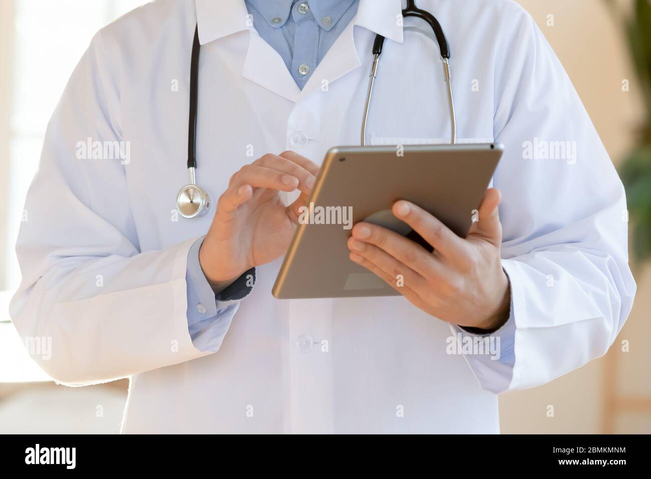 Male caucasian doctor notes hi-res stock photography and images - Alamy