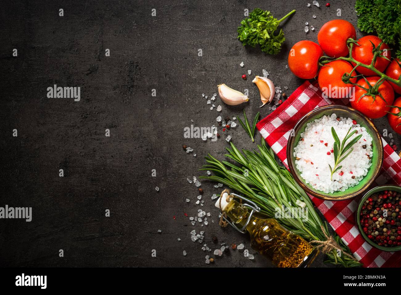 Food cooking background on black kitchen table Stock Photo - Alamy