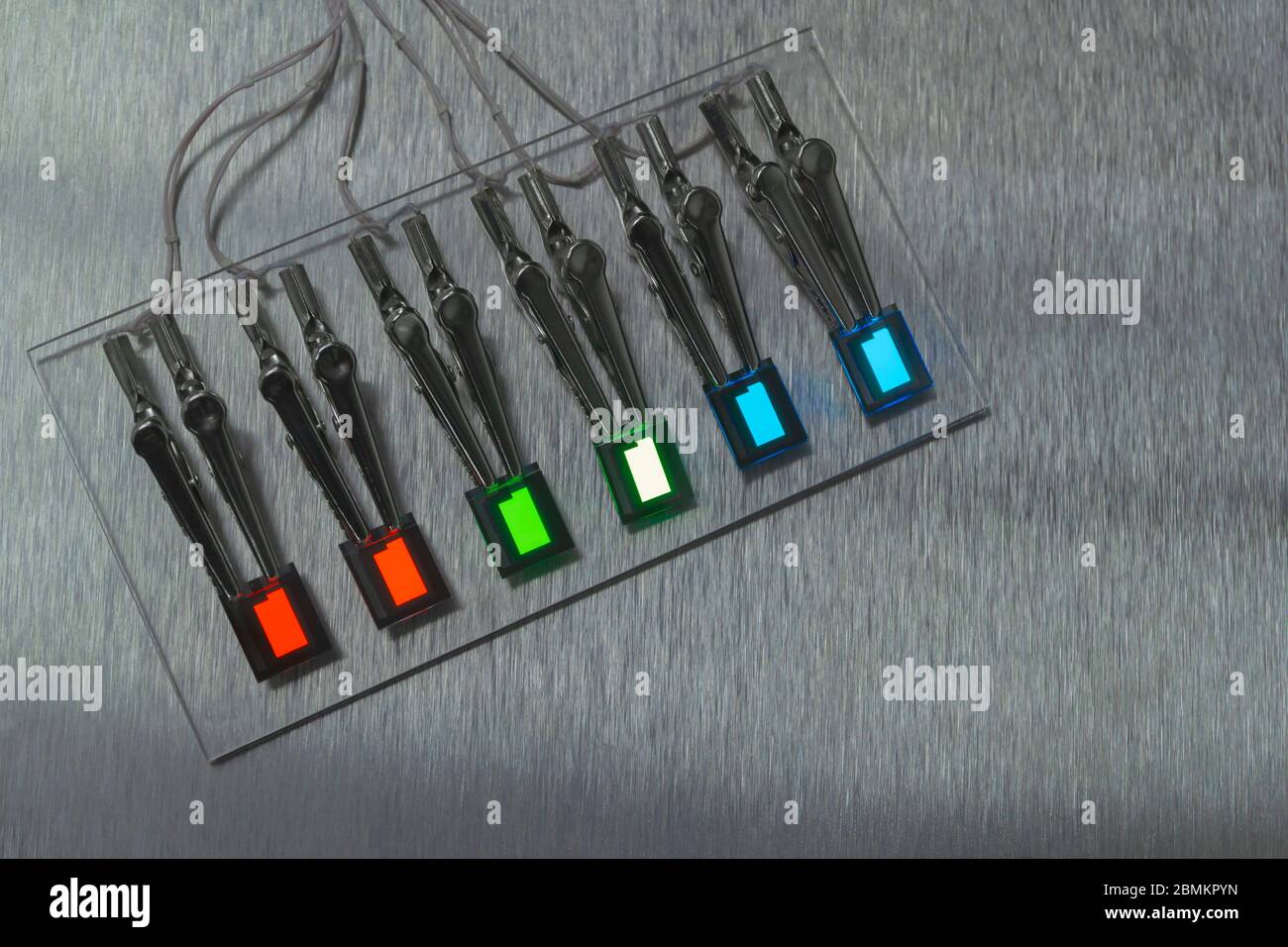 Several Red Green Blue color oled displays is lighting on a probecard ...