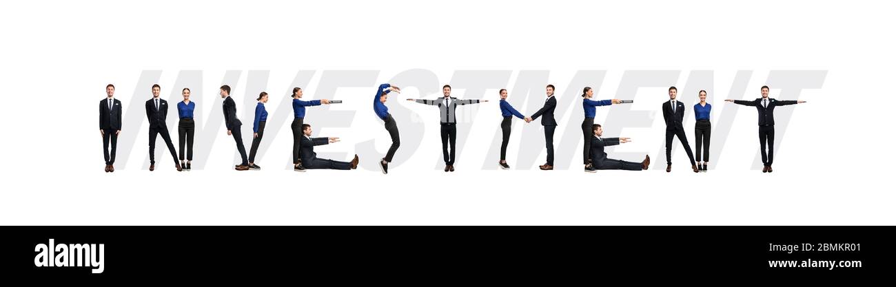 Group of people forming investment word at studio Stock Photo - Alamy