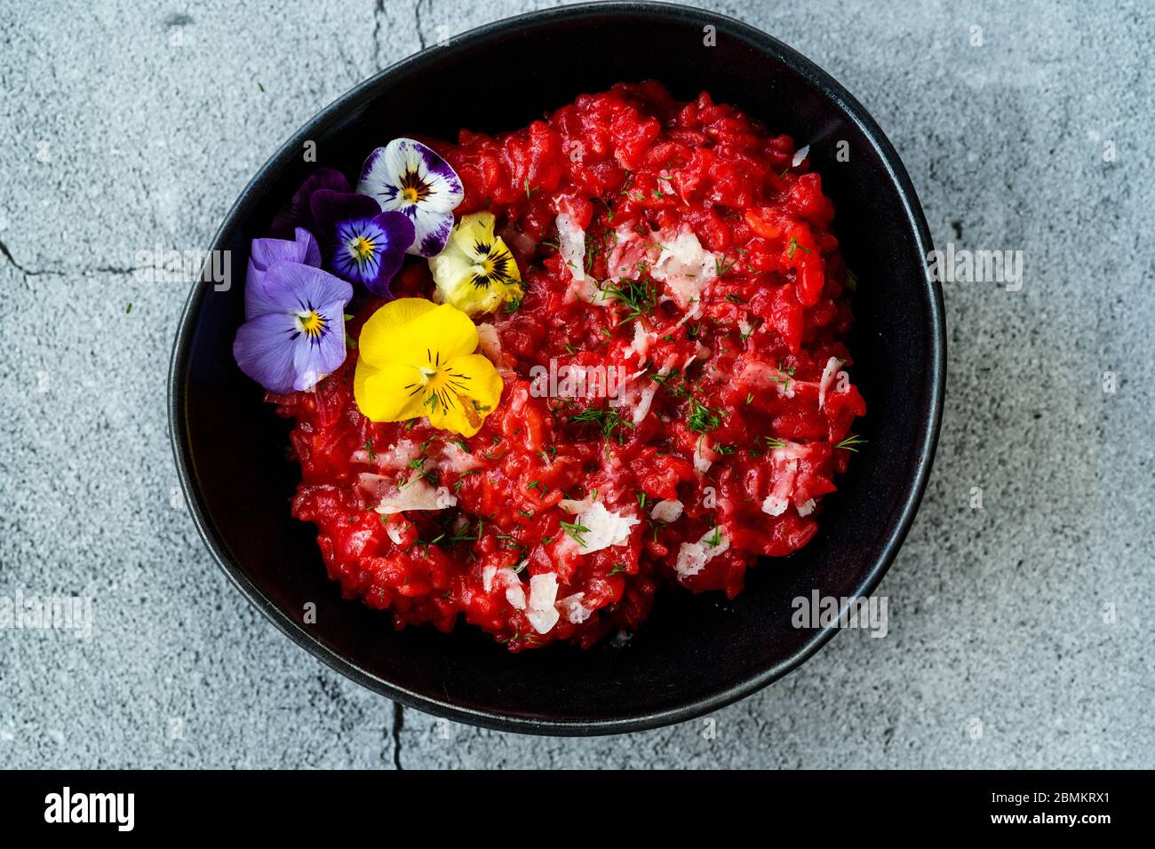 Beetroot Risotto with Edible Flowers and Parmesan Cheese made with ...