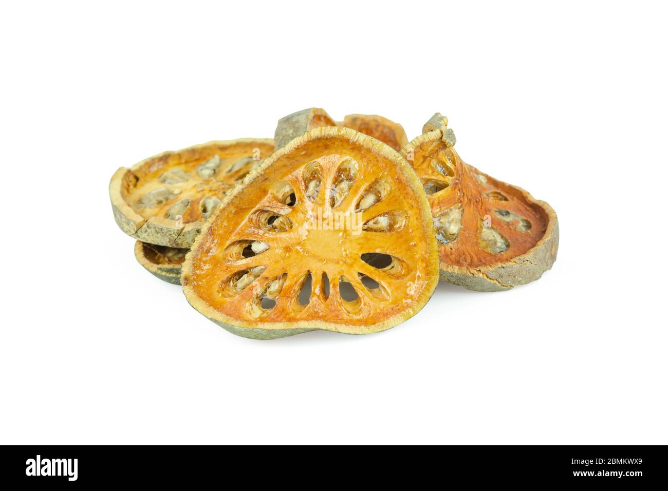 Slices of Bael fruit dried isolated on white background with clipping ...
