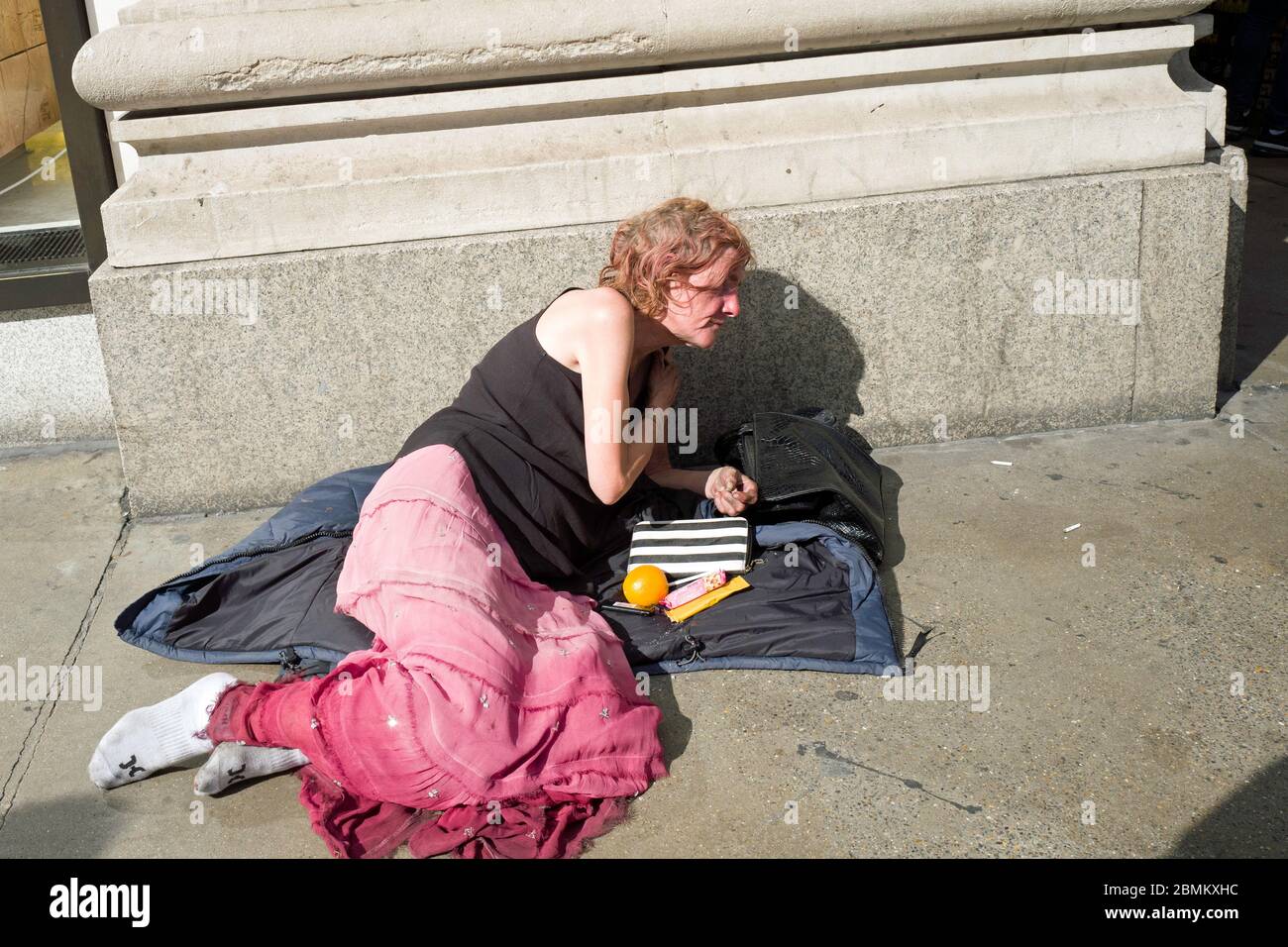 Homeless female beggar in Oxford Street Central London Stock Photo - Alamy