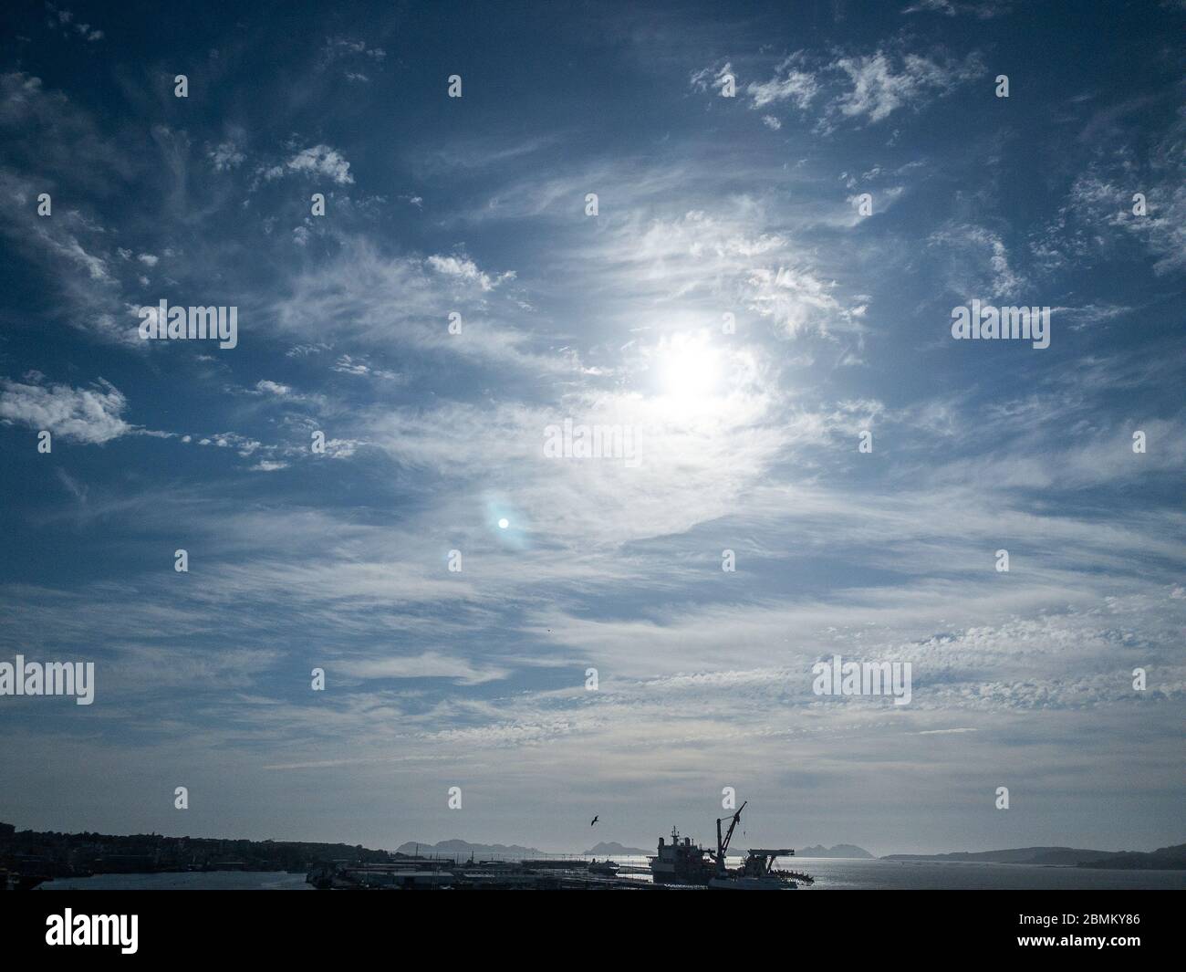 clean blue sky with clouds and the horizon Stock Photo - Alamy