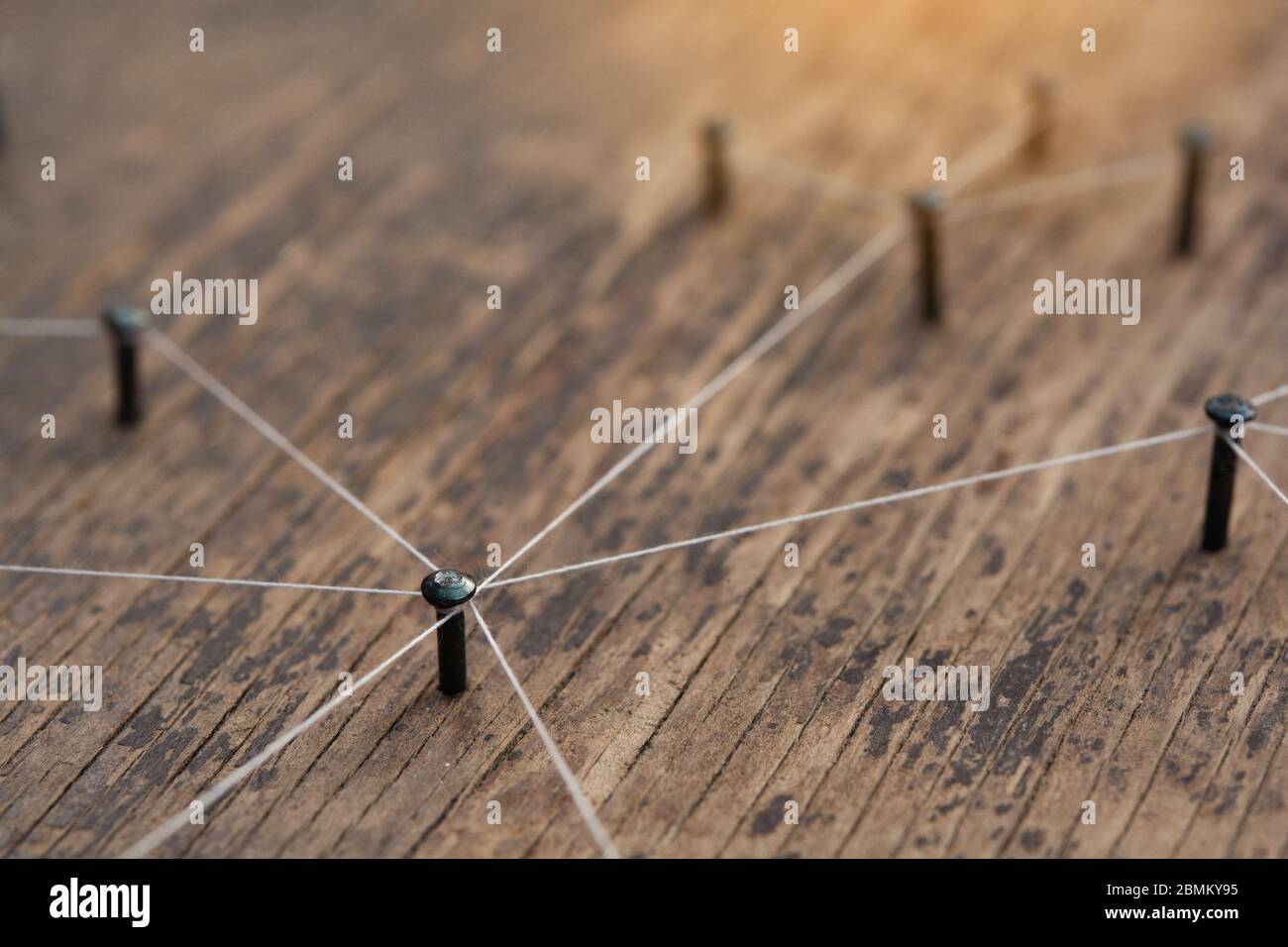 Connecting networks concept - network connected with yarn white on ...