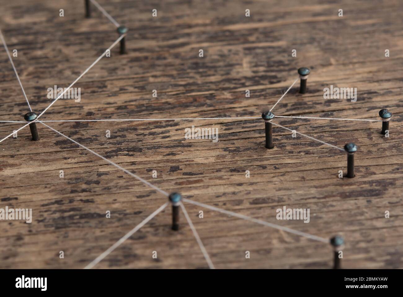 Connecting networks concept - network connected with yarn white on ...