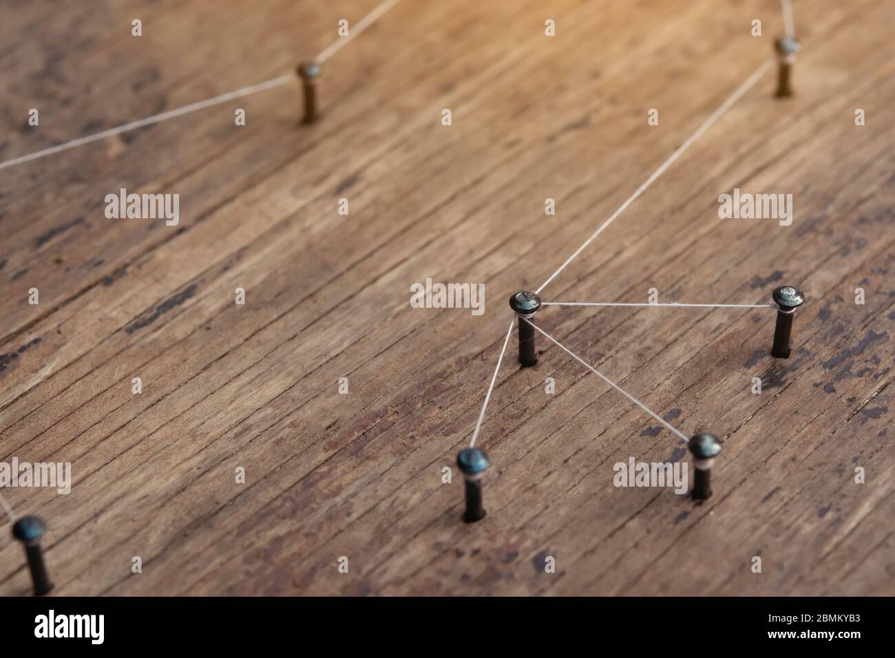 Connecting networks concept - network connected with yarn white on ...