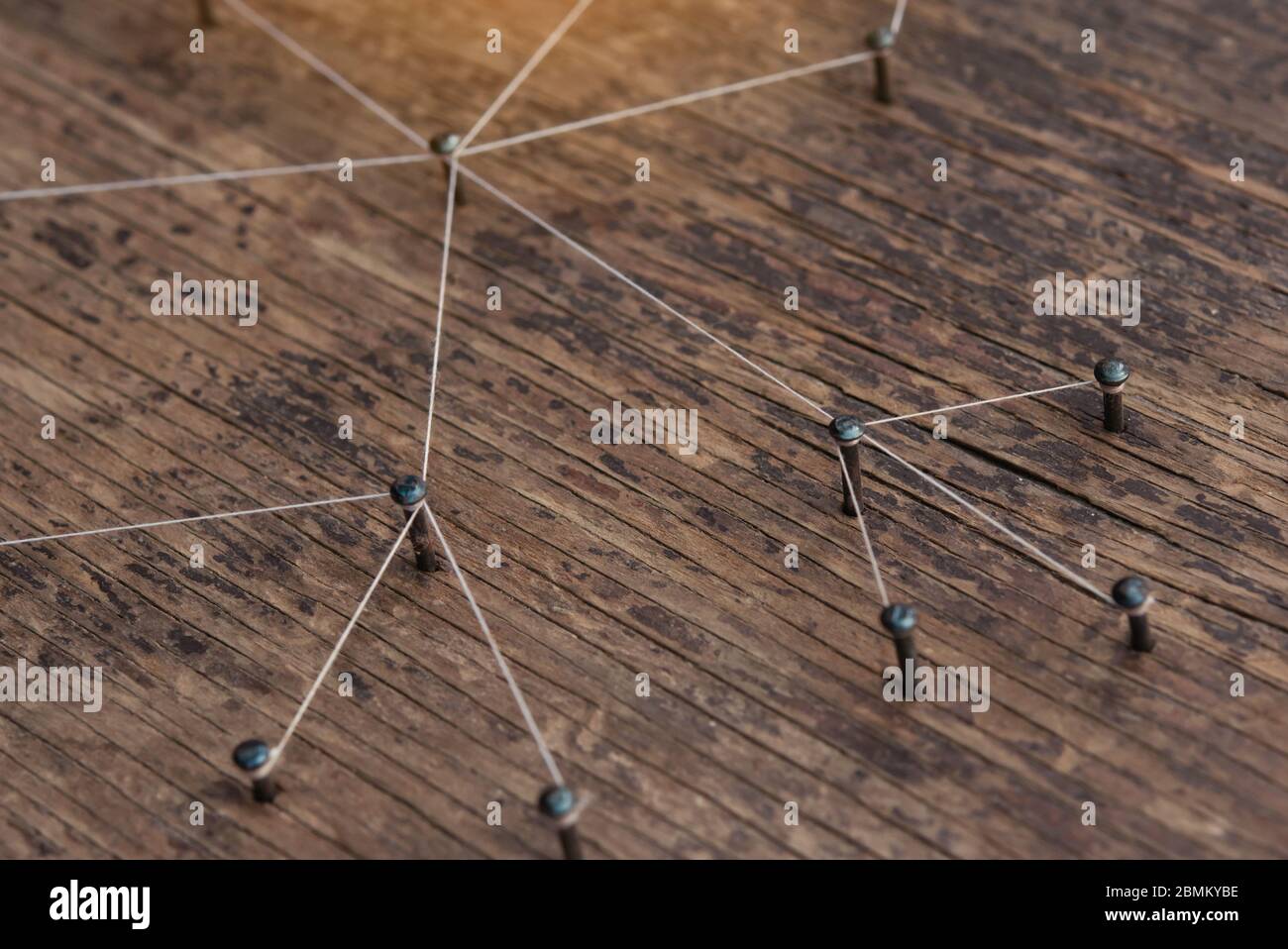 Connecting networks concept - network connected with yarn white on ...