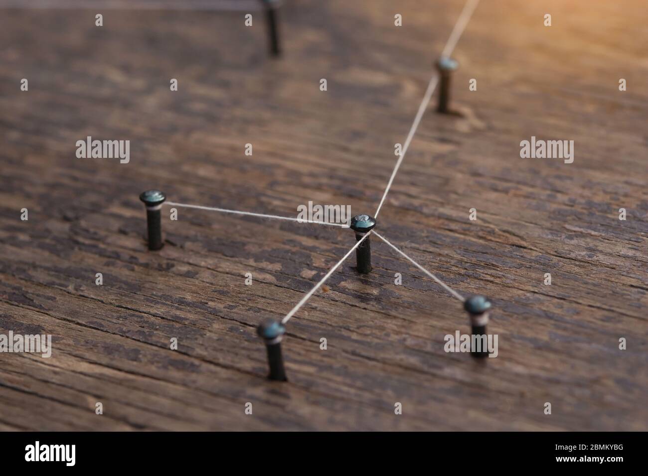 Connecting networks concept - network connected with yarn white on ...