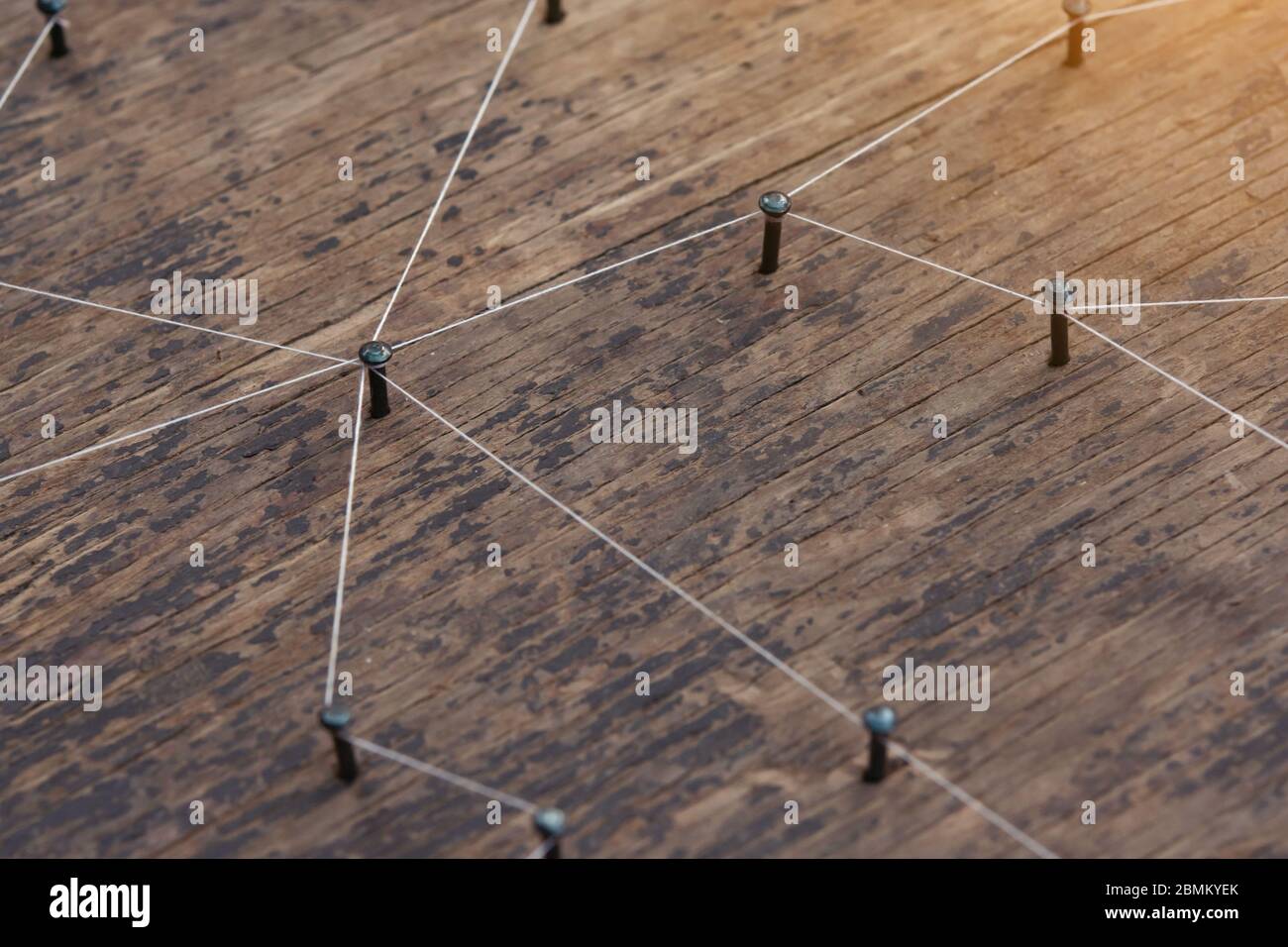 Connecting networks concept - network connected with yarn white on ...