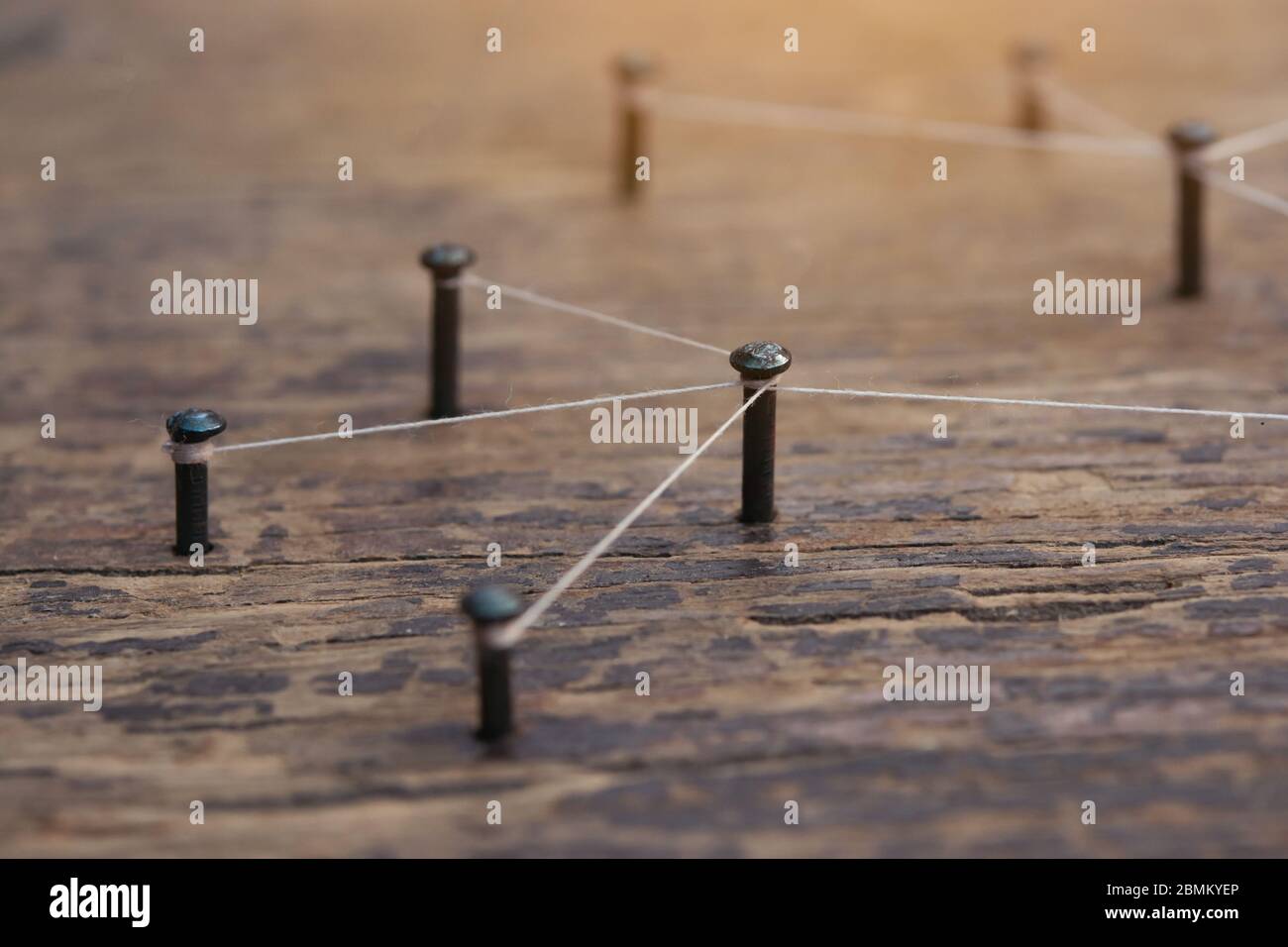 Connecting networks concept - network connected with yarn white on ...