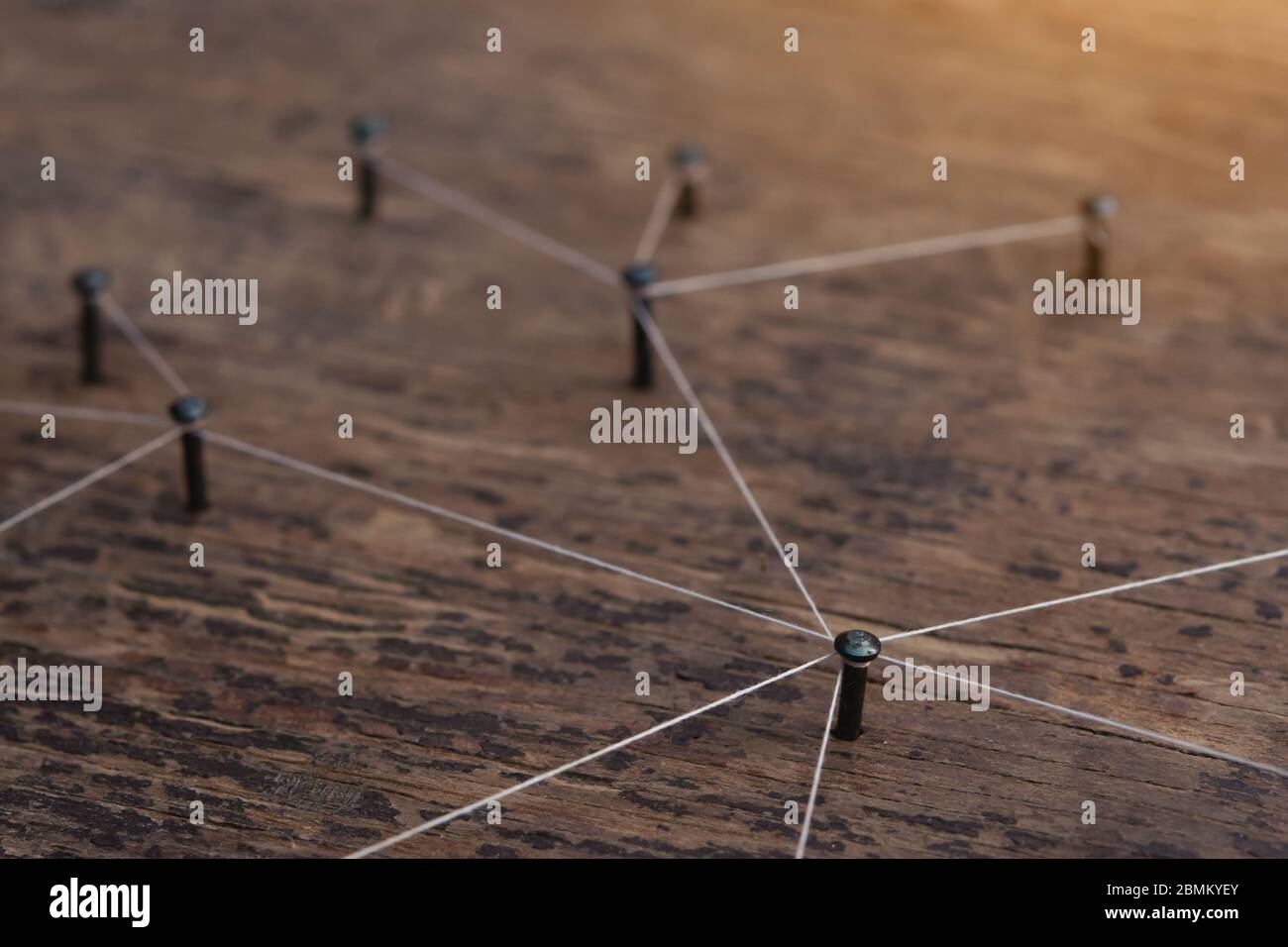 Connecting networks concept - network connected with yarn white on ...