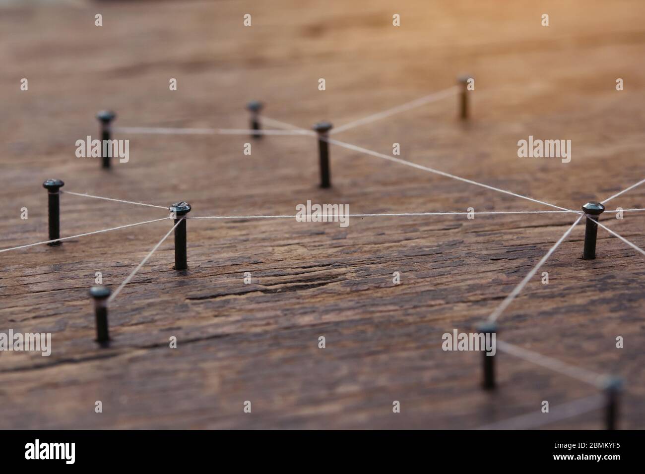 Connecting networks concept - network connected with yarn white on ...