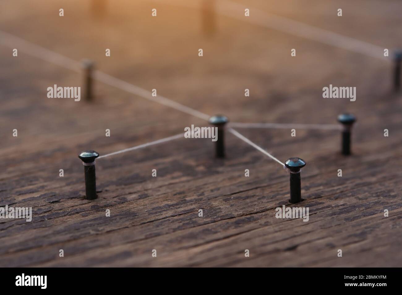 Connecting networks concept - network connected with yarn white on ...