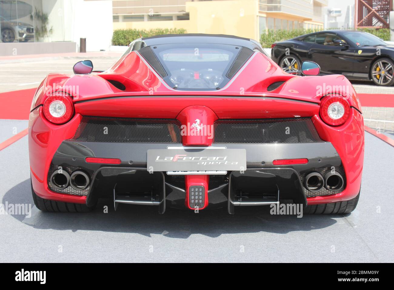 New official Ferrari dealer showroom in Dubai, United Arab Emirates ...