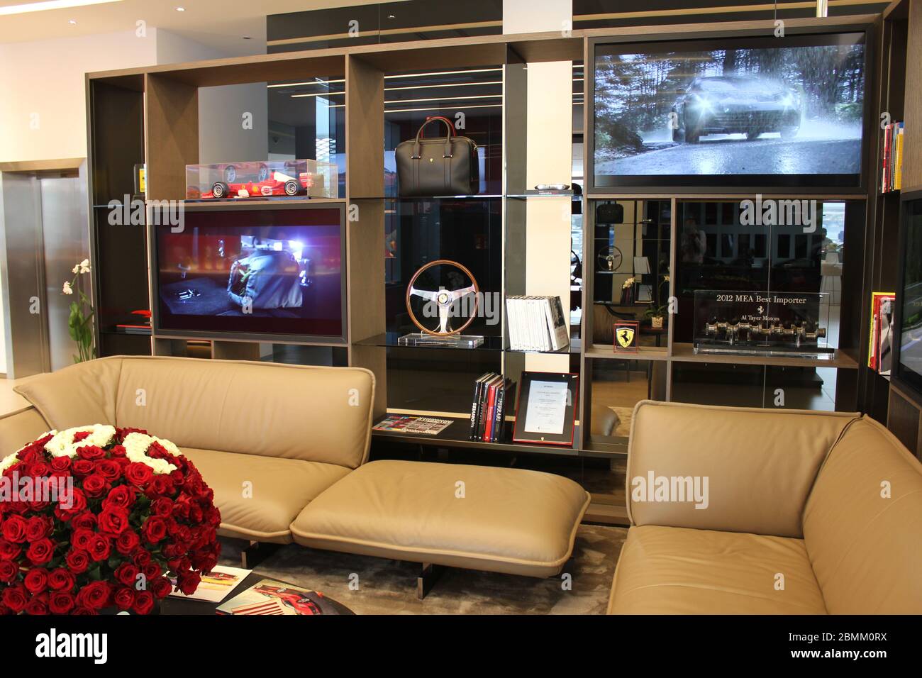 New official Ferrari dealer showroom in Dubai, United Arab Emirates ...