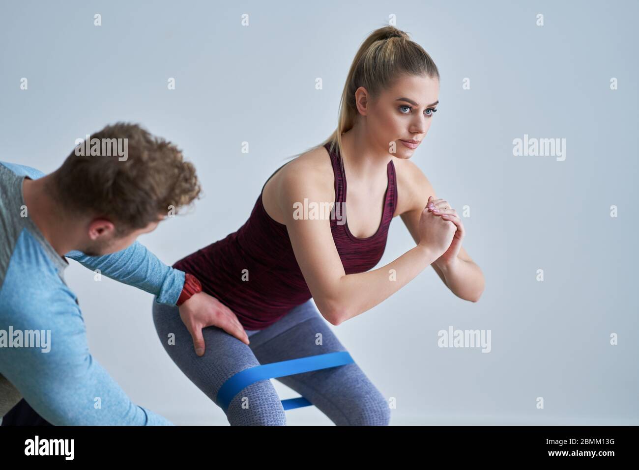 Adult woman training with her personal trainer Stock Photo - Alamy