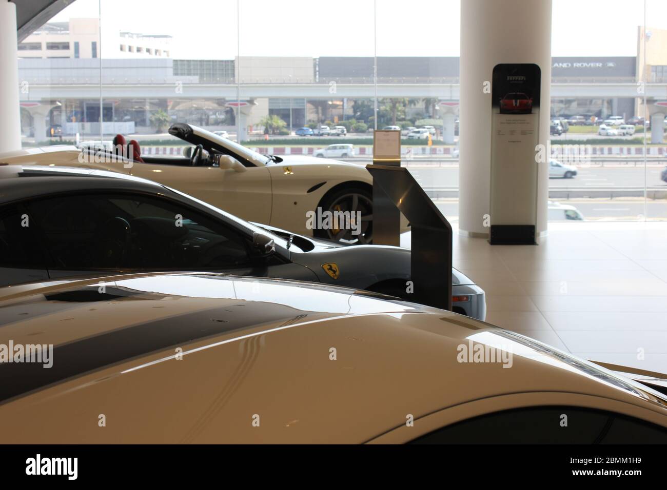 New official Ferrari dealer showroom in Dubai, United Arab Emirates ...