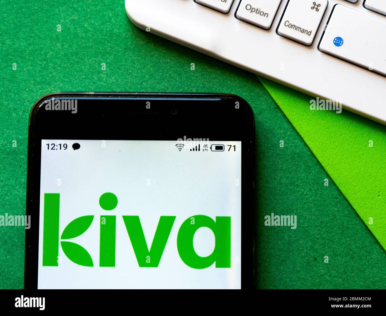 In this photo illustration Kiva Microfunds logo is seen displayed on a ...