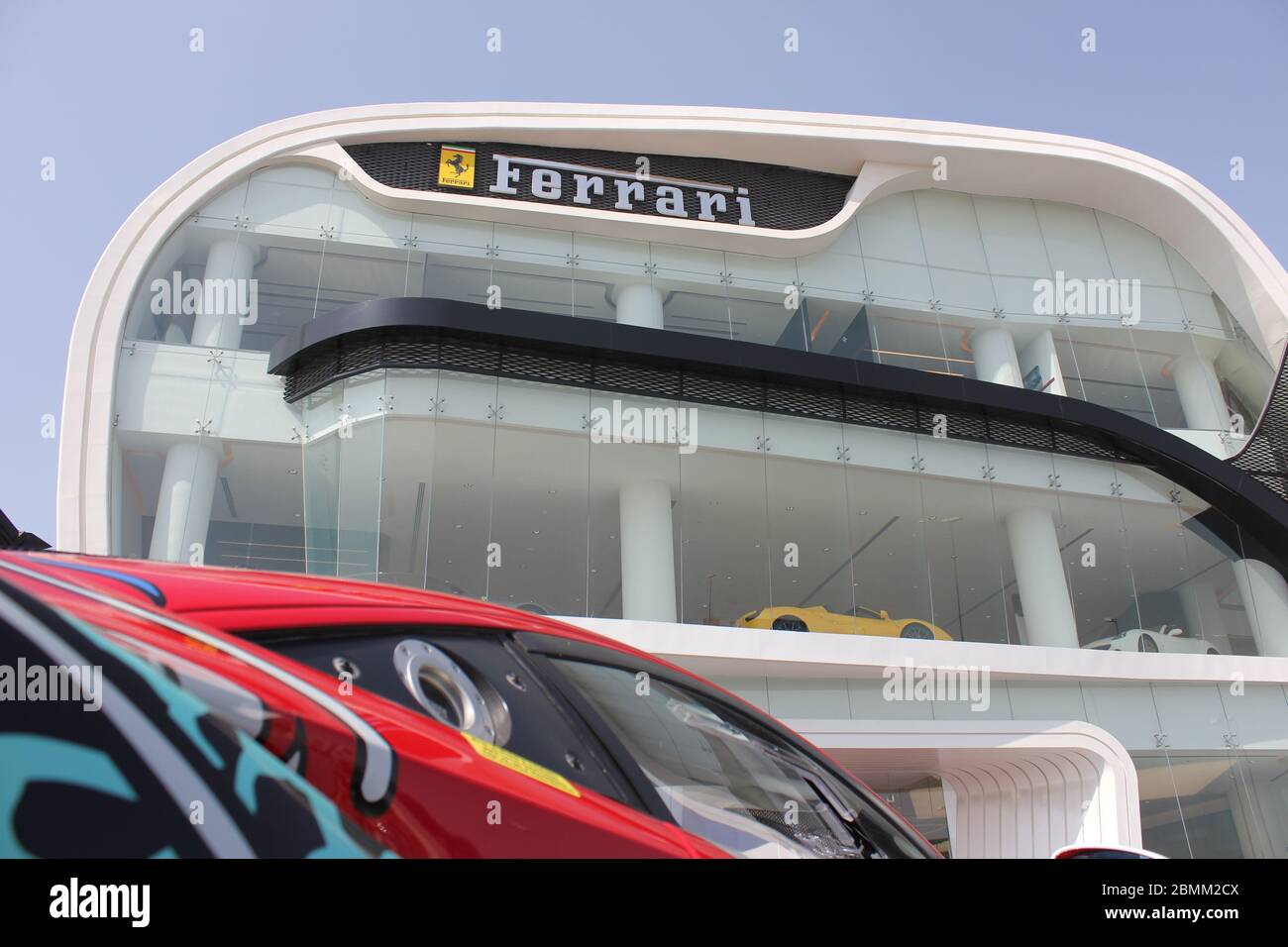 New official Ferrari dealer showroom in Dubai, United Arab Emirates ...