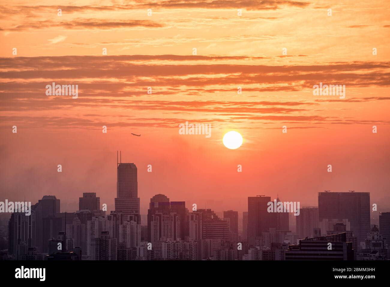 skyline of Shanghai at sunset Stock Photo - Alamy