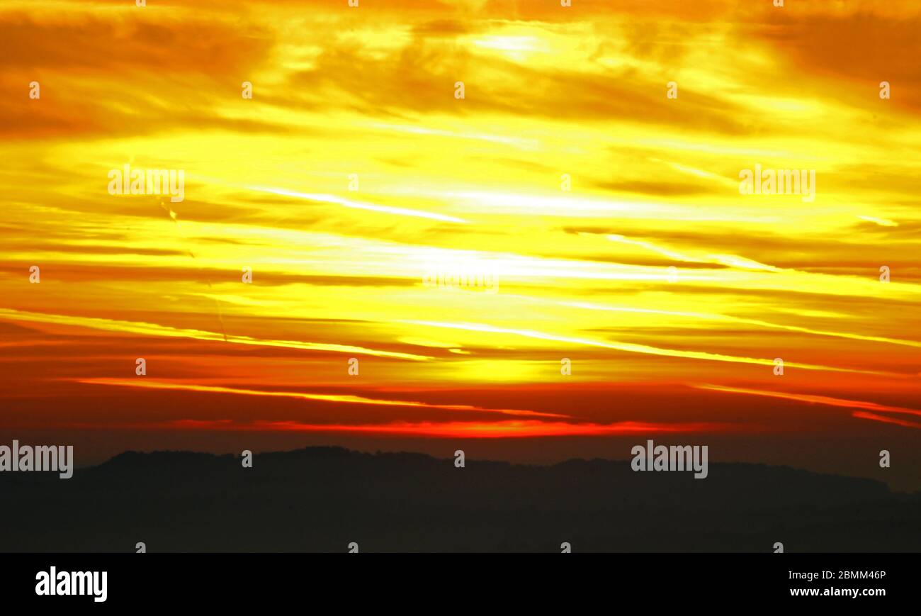 Sunrise looking towards Beeston headland from Borras Head, Wrexham ...