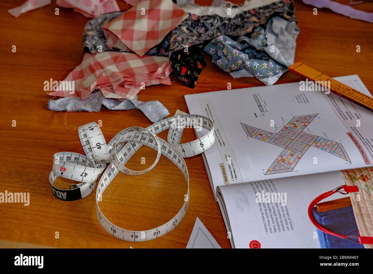 22 Crafting at home. Fabric, material, rule, pattern book and measuring ...