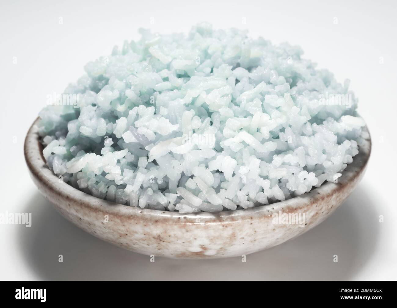 Blue color cooked rice by color of butterfly pea flower Stock Photo - Alamy