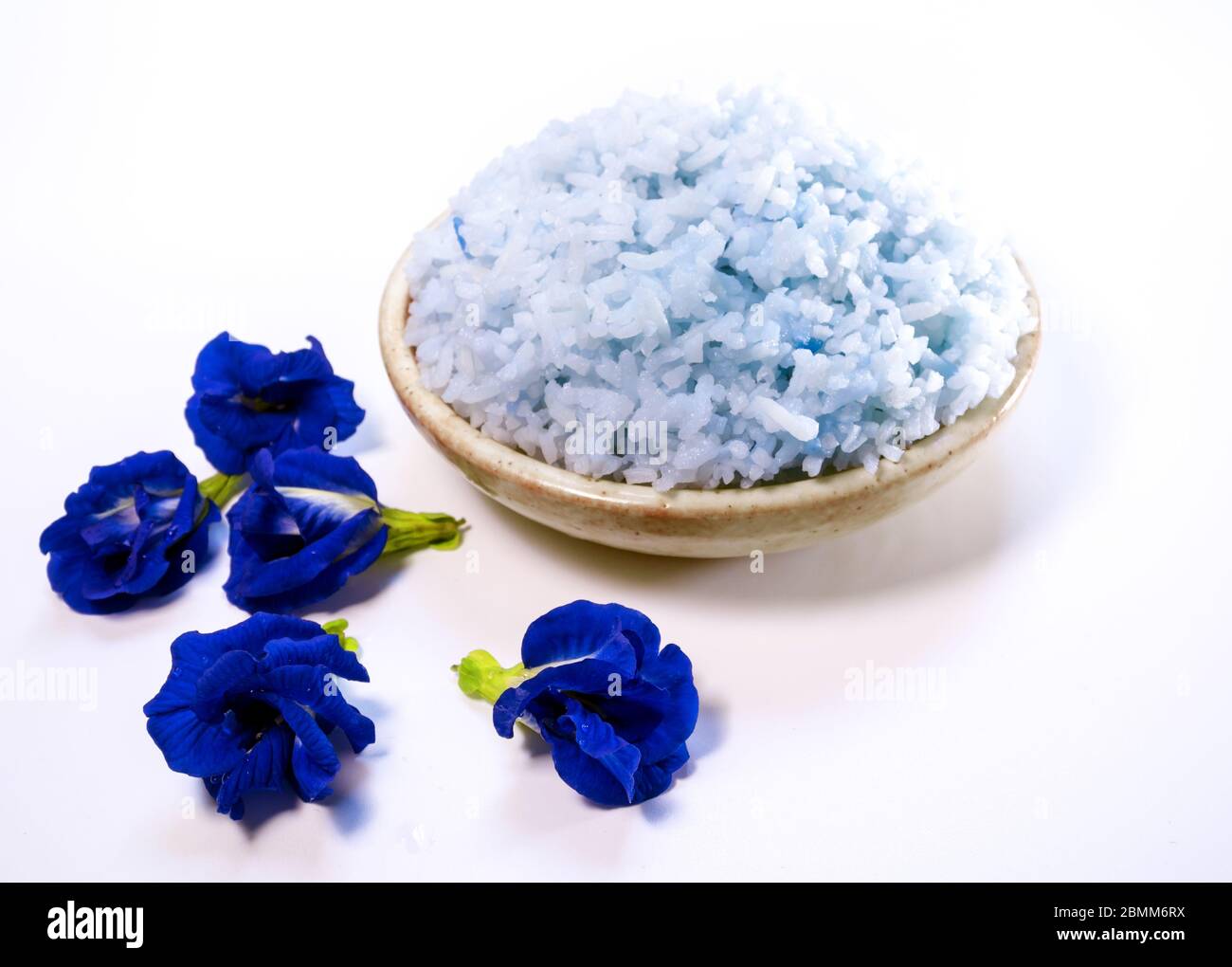 Blue color cooked rice by color of butterfly pea flower Stock Photo - Alamy