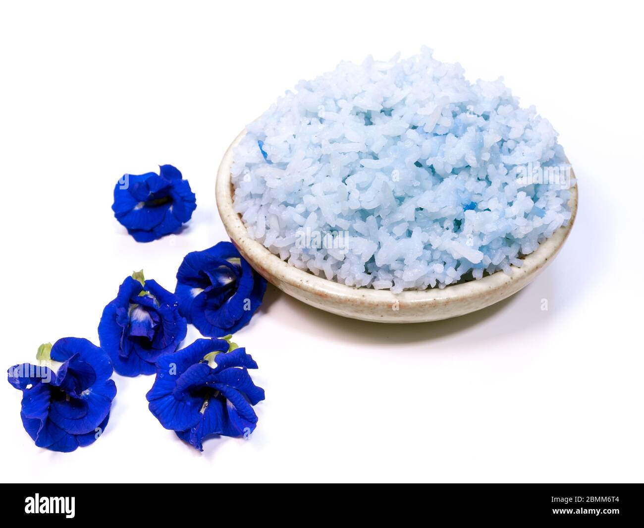 Blue color cooked rice by color of butterfly pea flower Stock Photo - Alamy