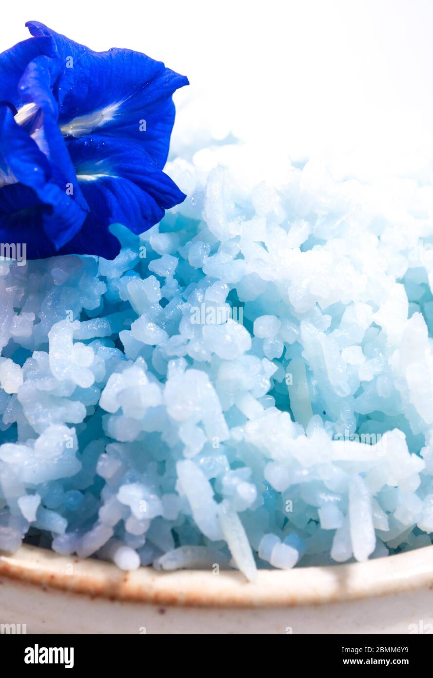 Blue color cooked rice by color of butterfly pea flower Stock Photo - Alamy