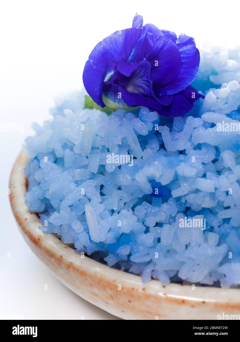 Blue color cooked rice by color of butterfly pea flower Stock Photo - Alamy