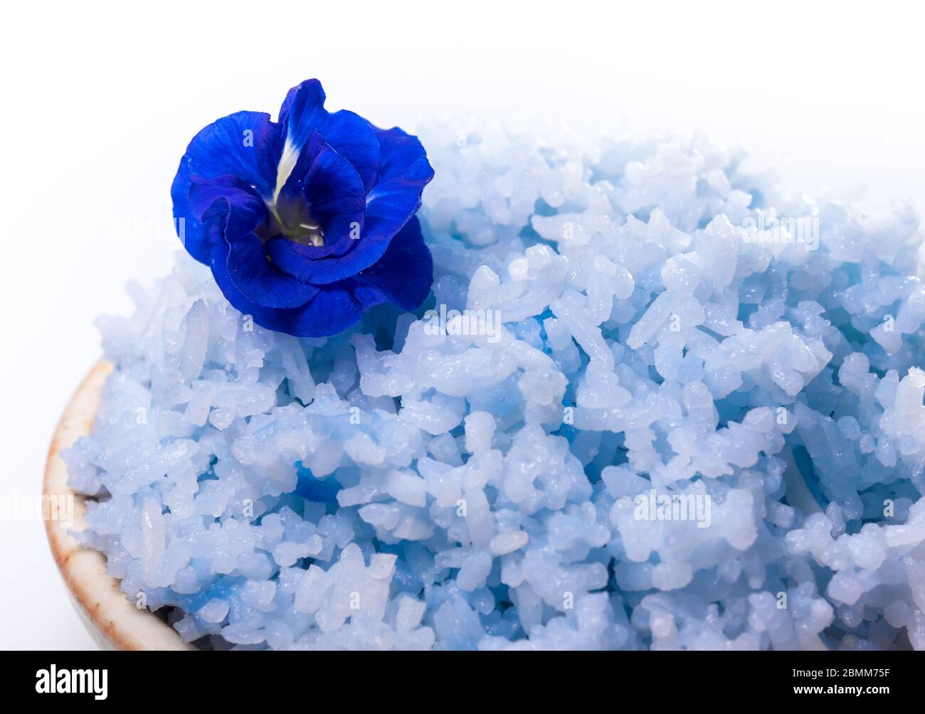 Blue color cooked rice by color of butterfly pea flower Stock Photo - Alamy