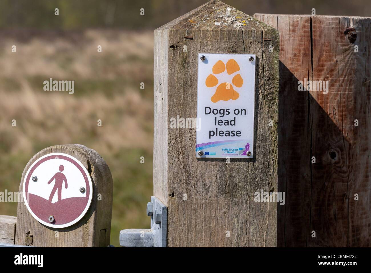 Dogs on Lead Please and footpath walking sign on fencepost, Sutton ...