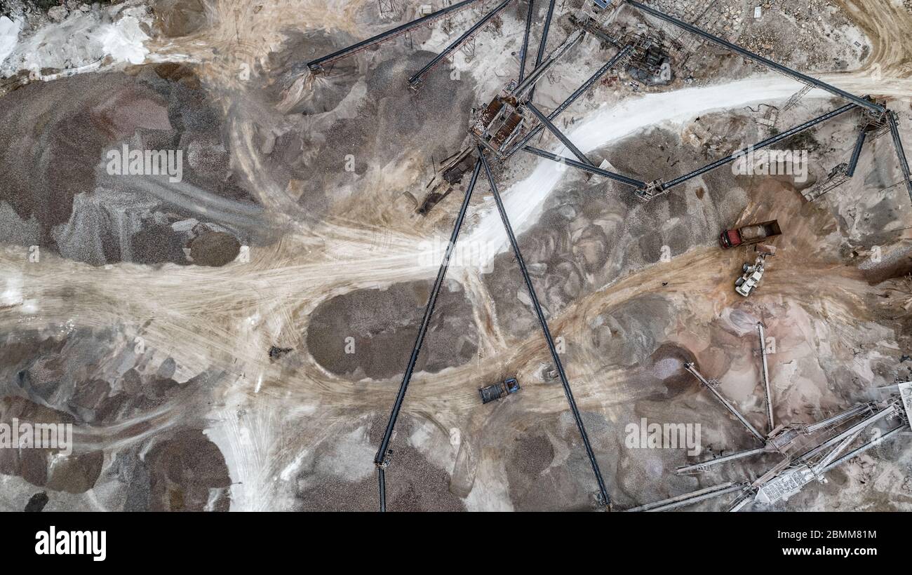 Aerial view of crushed stone quarry machine in a construction material ...