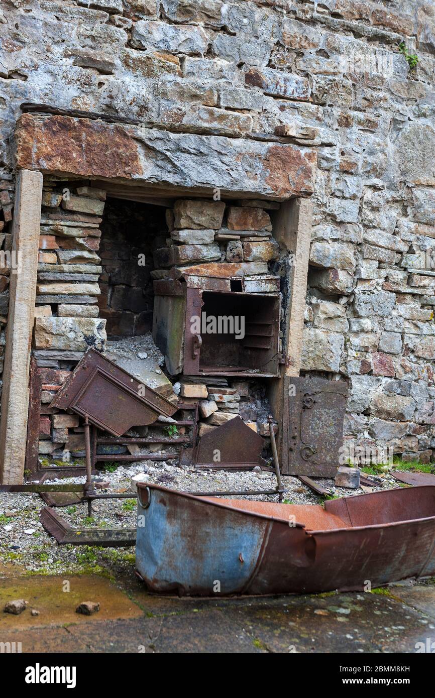 Evocative remains of the fireplace and range in the ruins of Crackpot ...