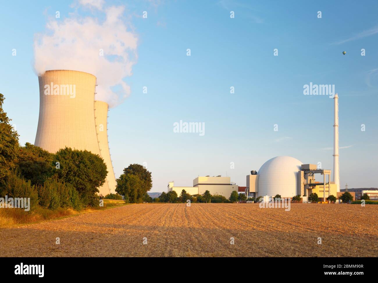 Reactor building, smoke stack and two cooling towers of a nuclear power ...