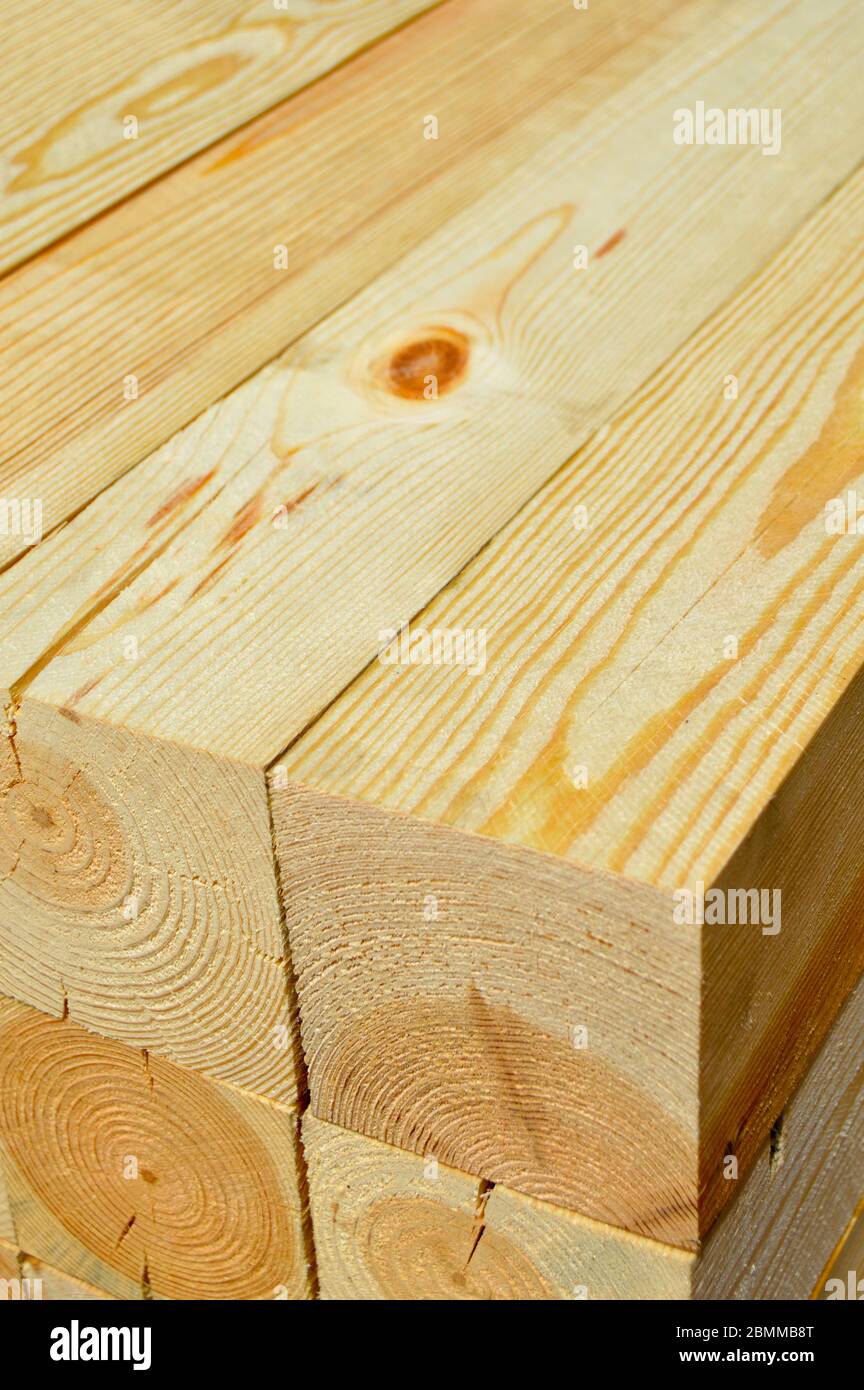 Pine lumber stacked in a row at the sawmill, lumber stack for storage ...