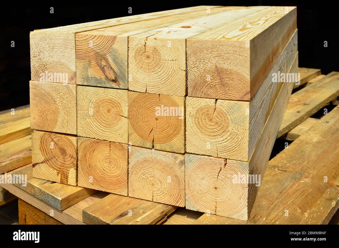 Pine lumber stacked in a row at the sawmill, lumber stack for storage ...
