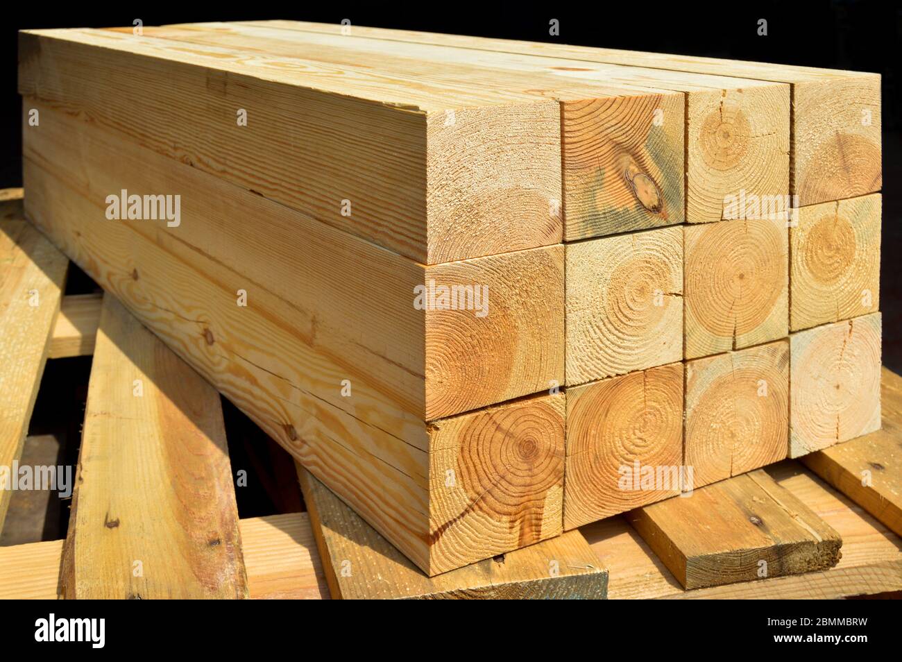 Pine lumber stacked in a row at the sawmill, lumber stack for storage ...