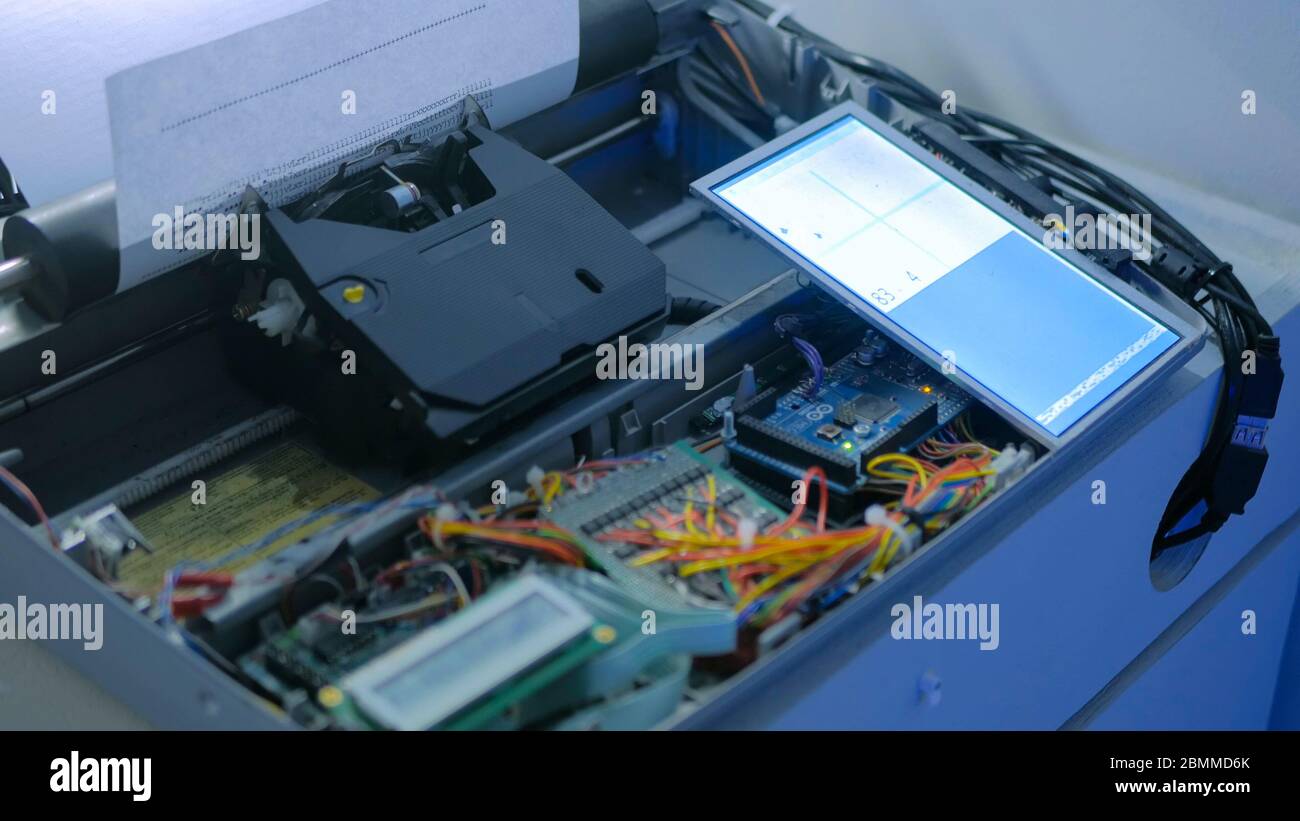 Typewriter robot drawing symbols picture at technology exhibition ...