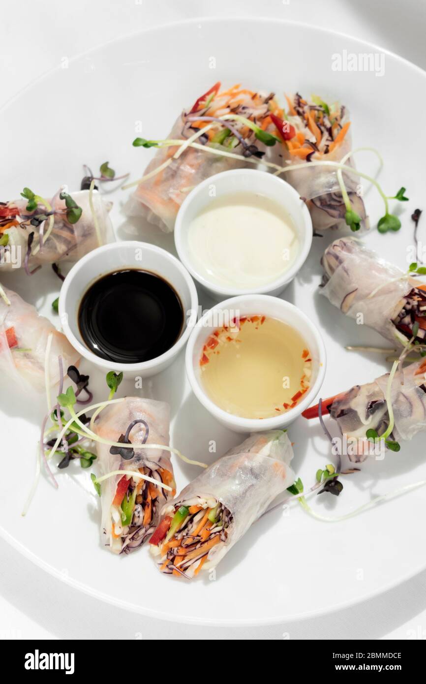 asian fresh vegetable vegan spring rolls with sauces in vietnam Stock ...