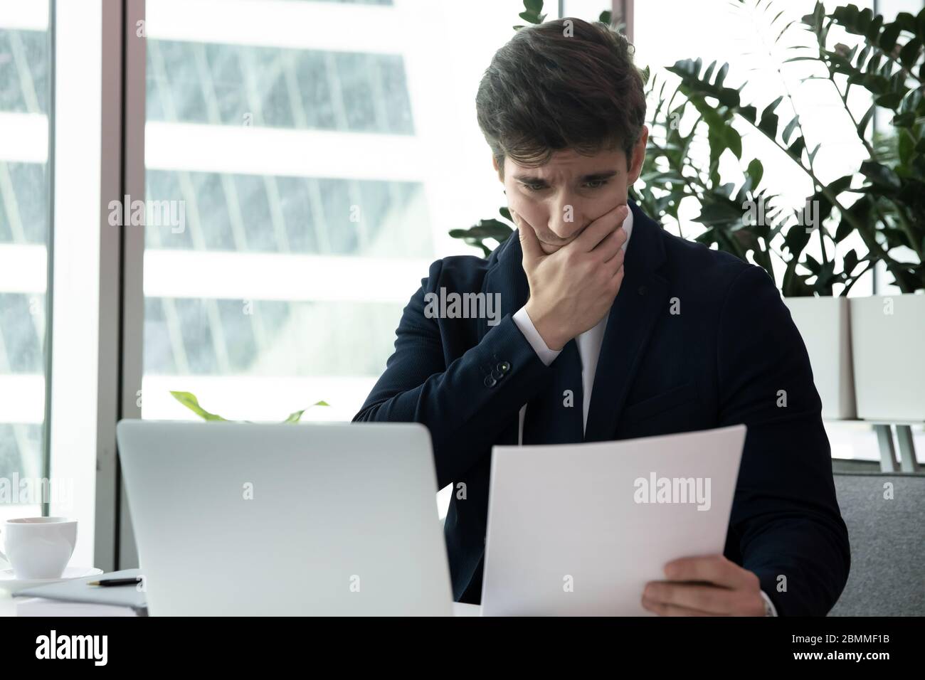 Frustrated man sit desk hi-res stock photography and images - Alamy
