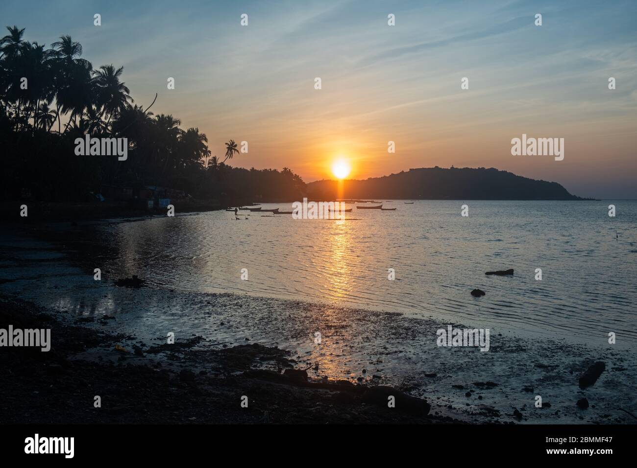 Sunset on the coast of Goa, India Stock Photo - Alamy