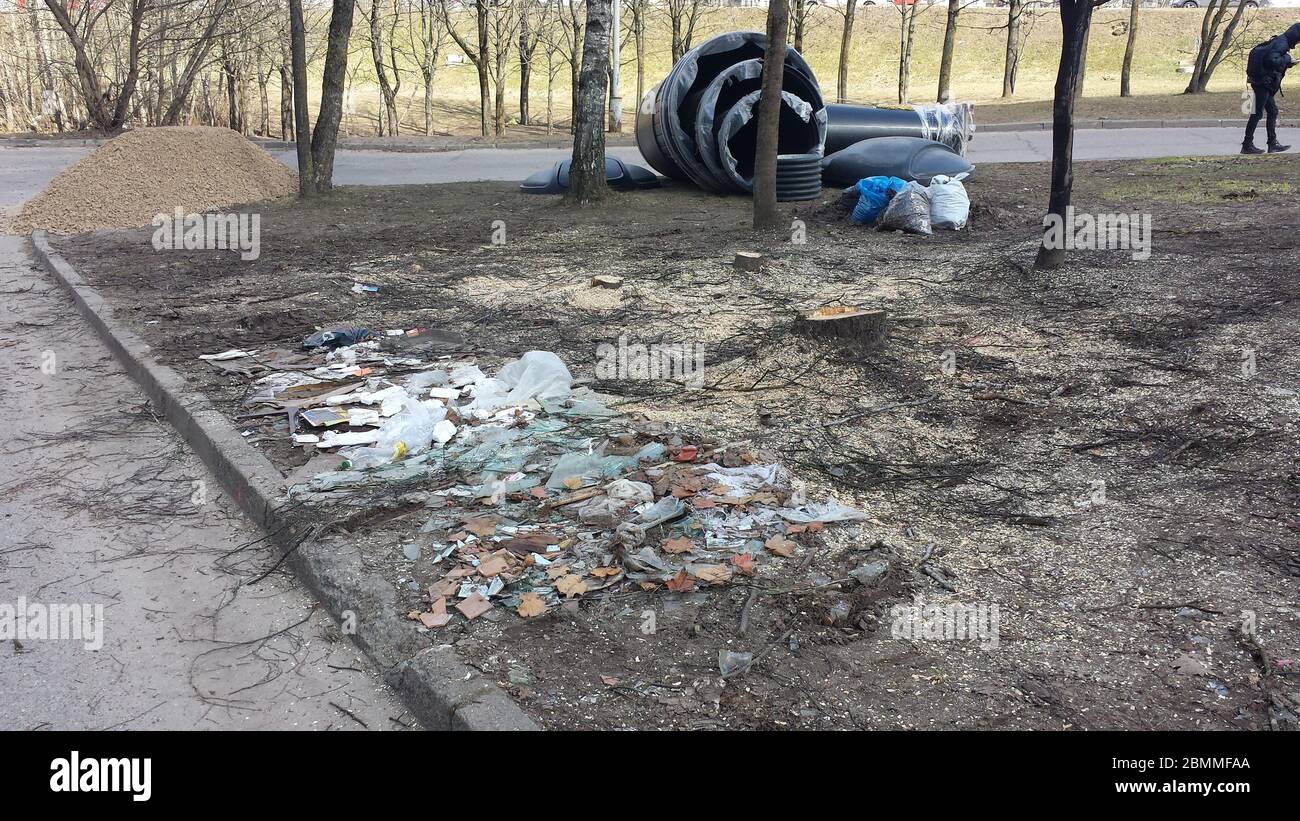 Trash leftovers on the ground after huge trash bins been removed Stock ...