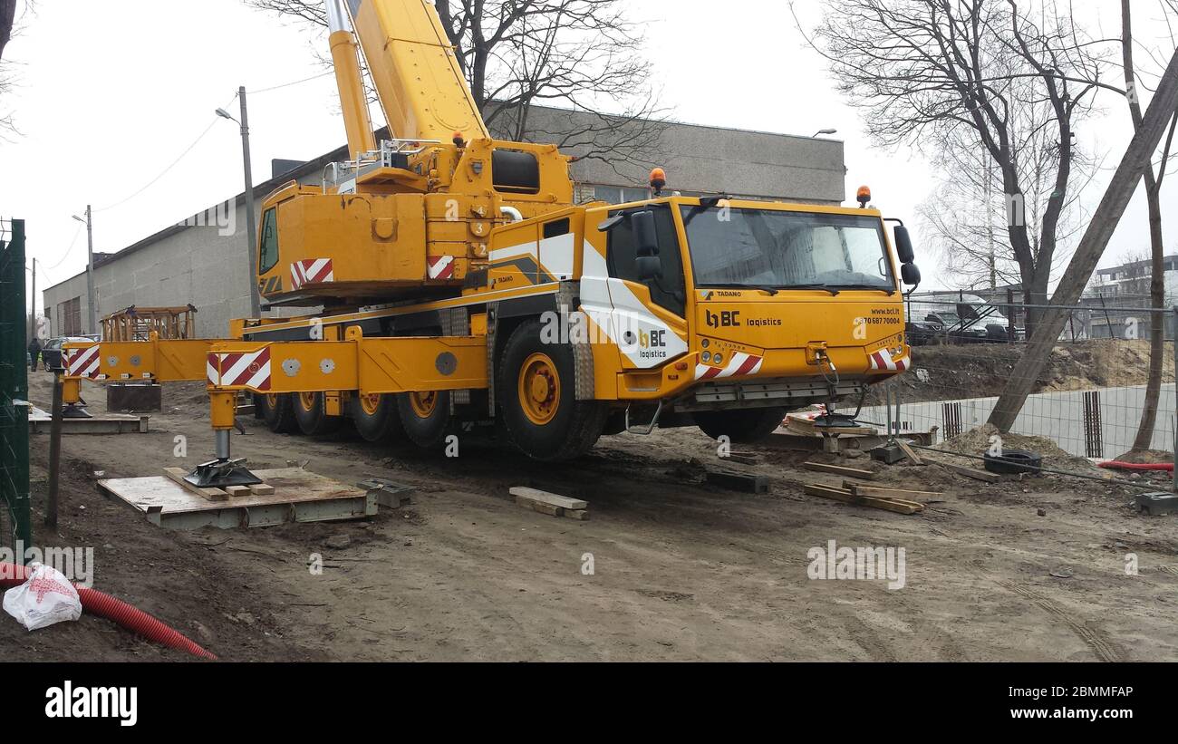 Construction site with a crane ready to lift heavy weight Stock Photo ...
