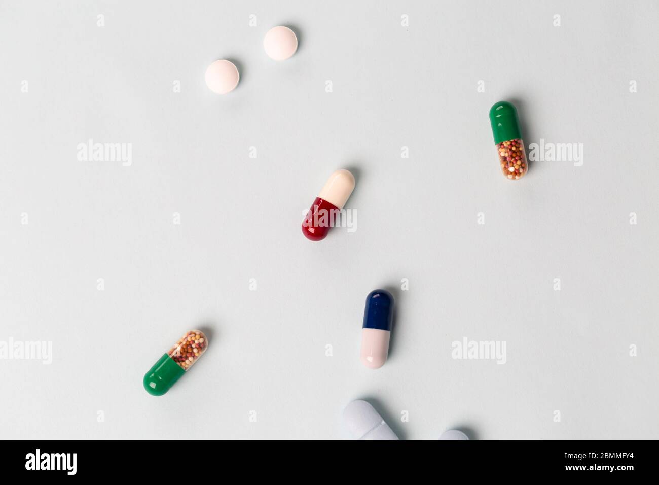Different medications.Various pills and capsules. One-color backdrop ...