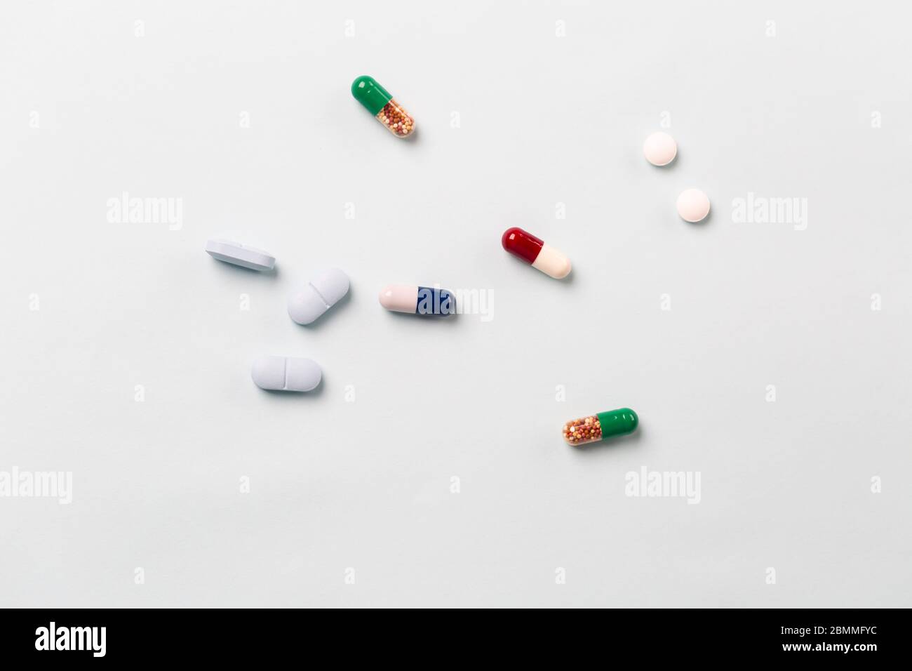 Different medications.Various pills and capsules. One-color backdrop ...
